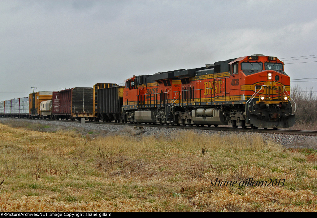 BNSF 4838 brings a freight SB.